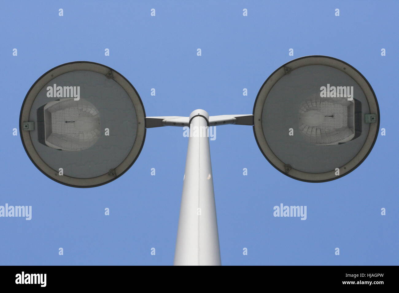 street light with two lamps,blue sky in the background straenlaterne ...