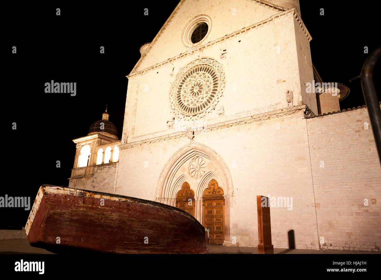 Facade of church at night illuminated. Assisi, Umbria. Italy Stock ...