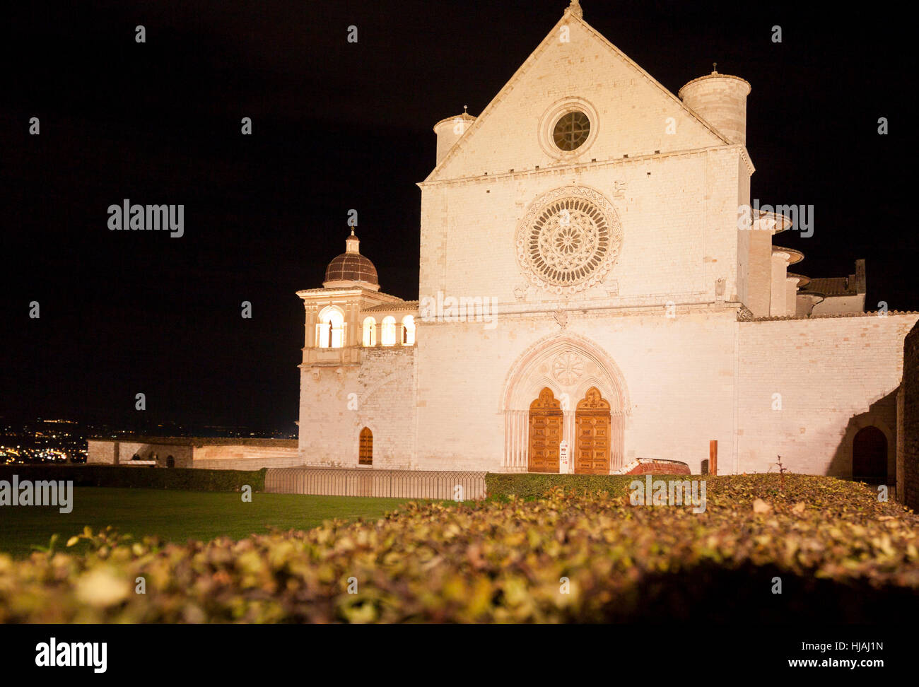 Facade of church at night illuminated. Assisi, Umbria. Italy Stock ...