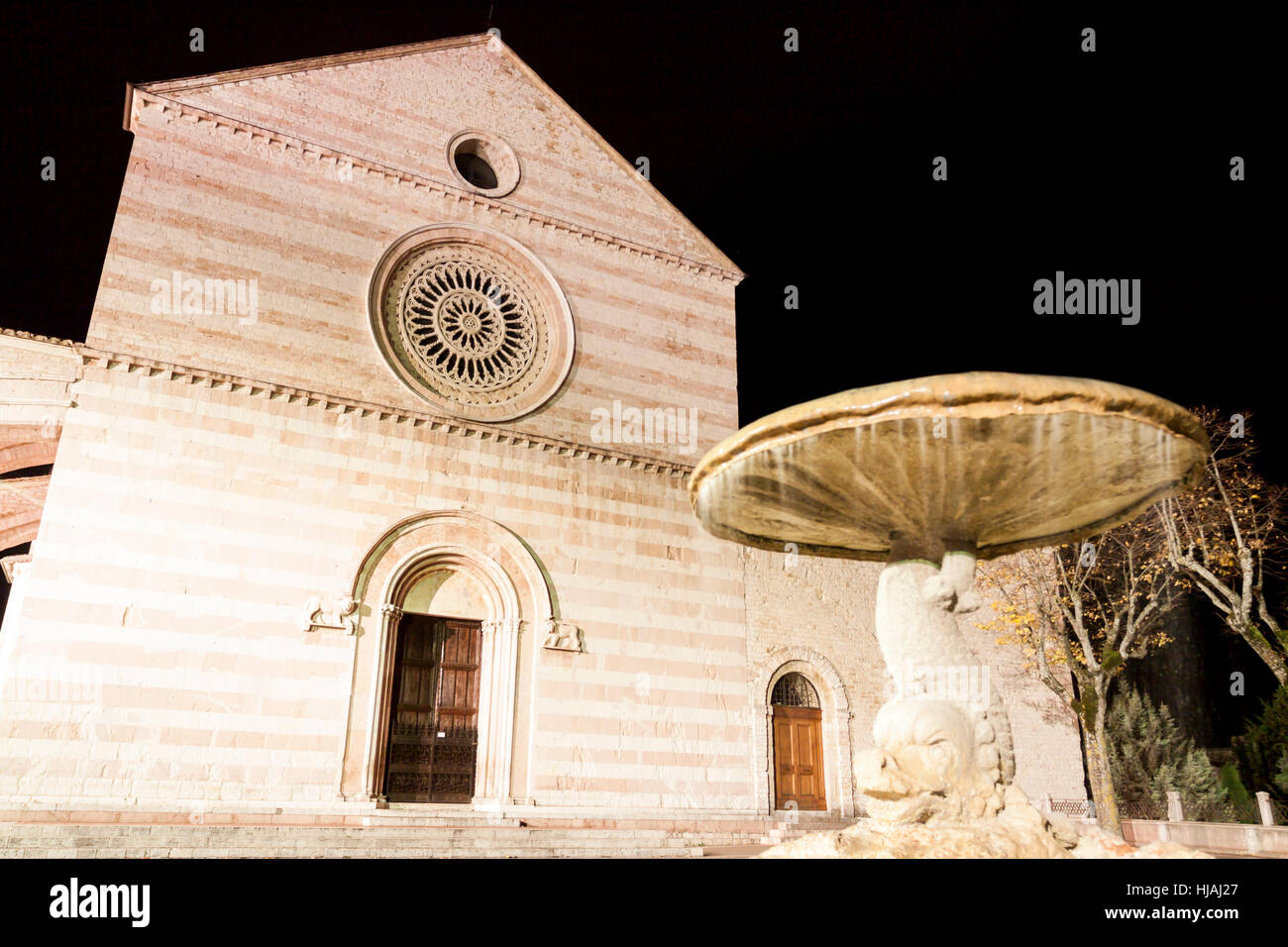 Facade of church at night illuminated. Assisi, Umbria. Italy Stock ...