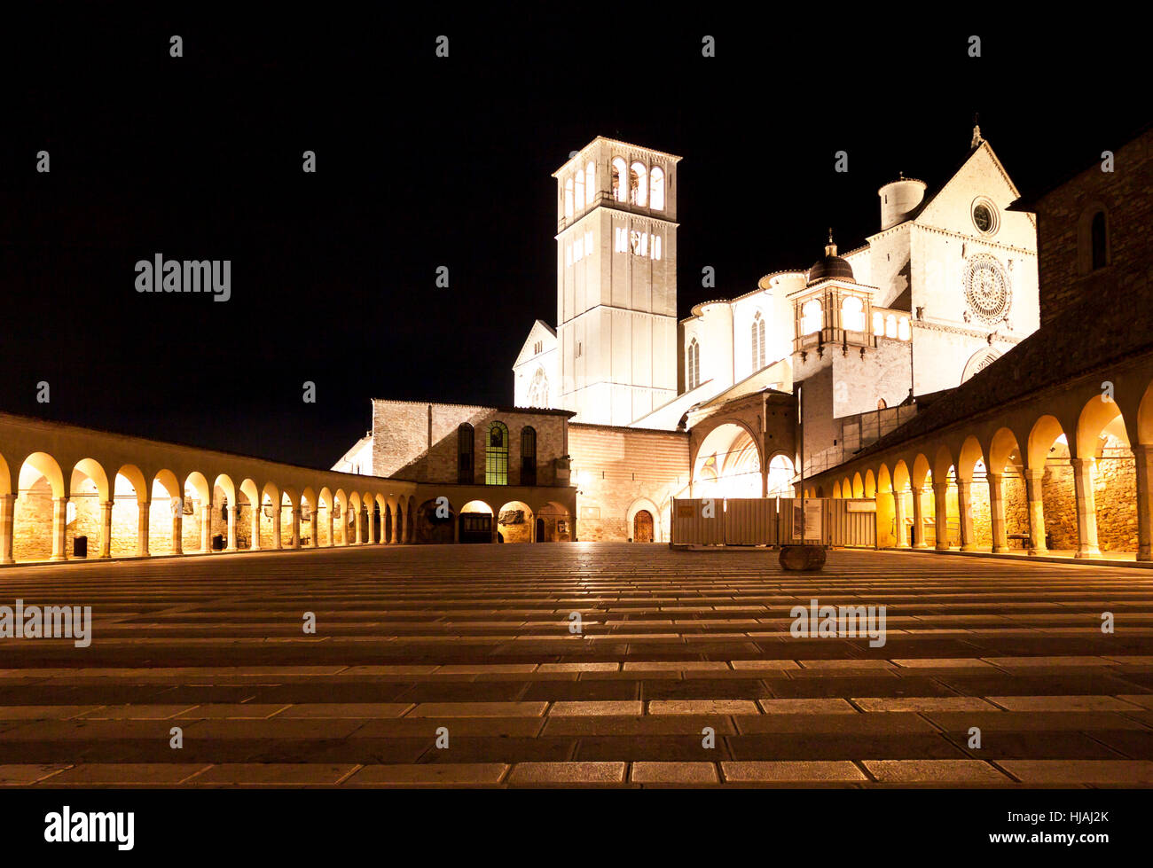 Facade of church at night illuminated. Assisi, Umbria. Italy Stock ...