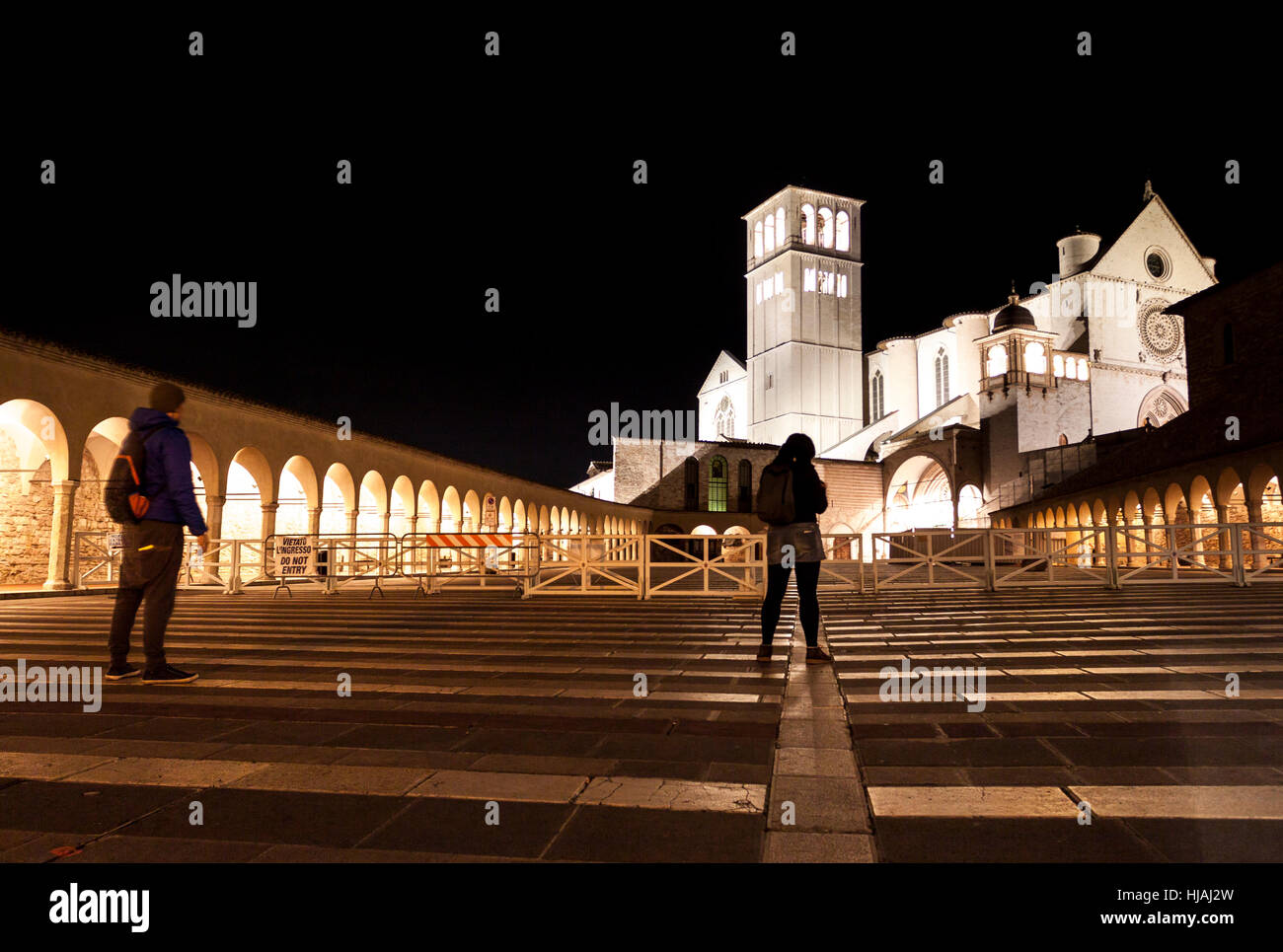 Facade of church at night illuminated. Assisi, Umbria. Italy Stock ...