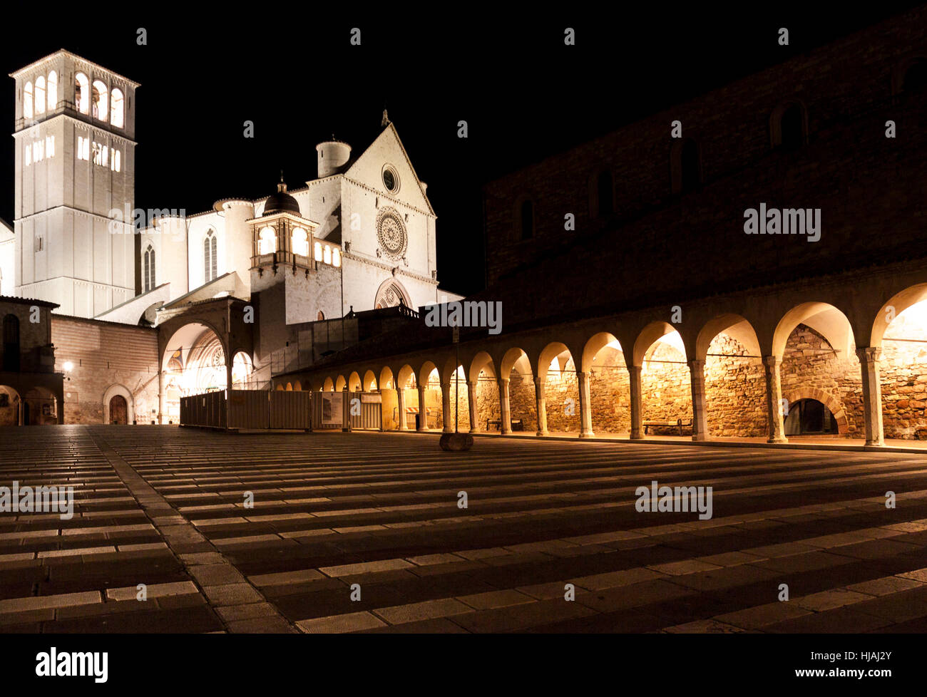 Facade of church at night illuminated. Assisi, Umbria. Italy Stock ...