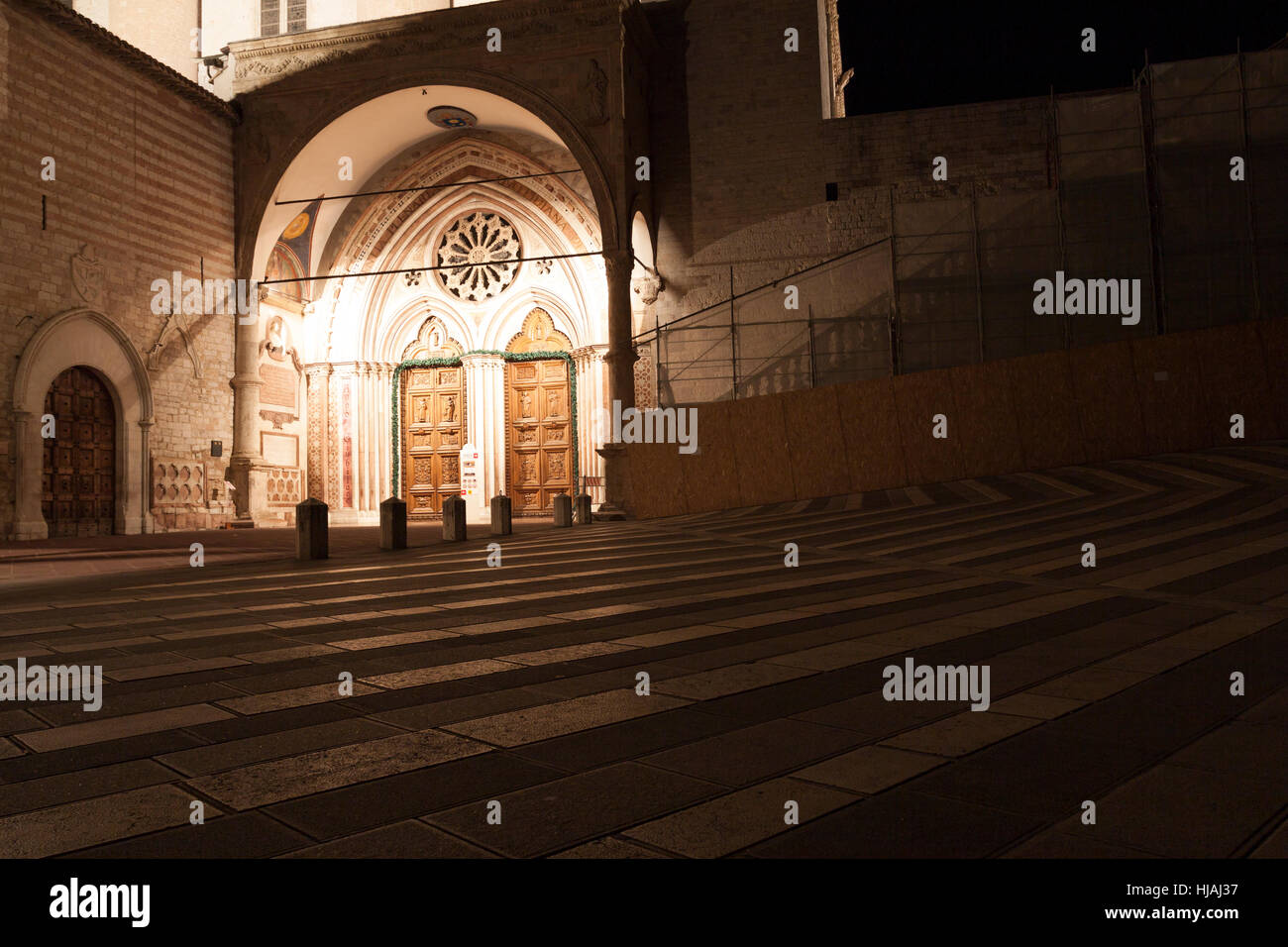 Facade of church at night illuminated. Assisi, Umbria. Italy Stock ...