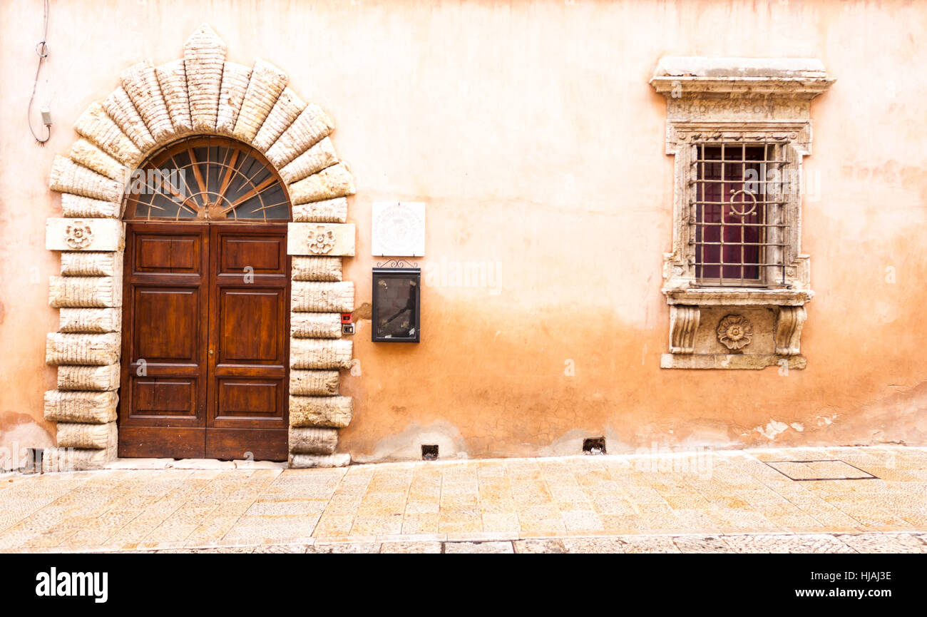 Facade of house. Assisi, Umbria. Italy Stock Photo - Alamy