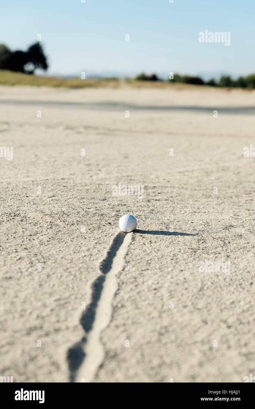 Golf ball in sand bunker. Golf Concept Stock Photo - Alamy