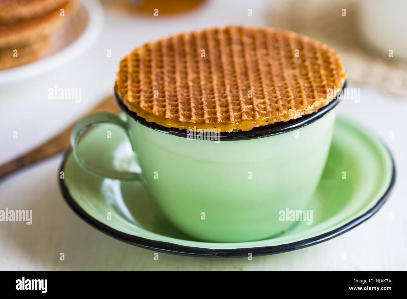 Traditional Dutch waffle called Stroopwafel on coffee cup Stock Photo ...