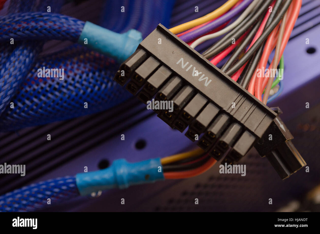 A blue power supply unit with the main power cable in focus Stock Photo ...