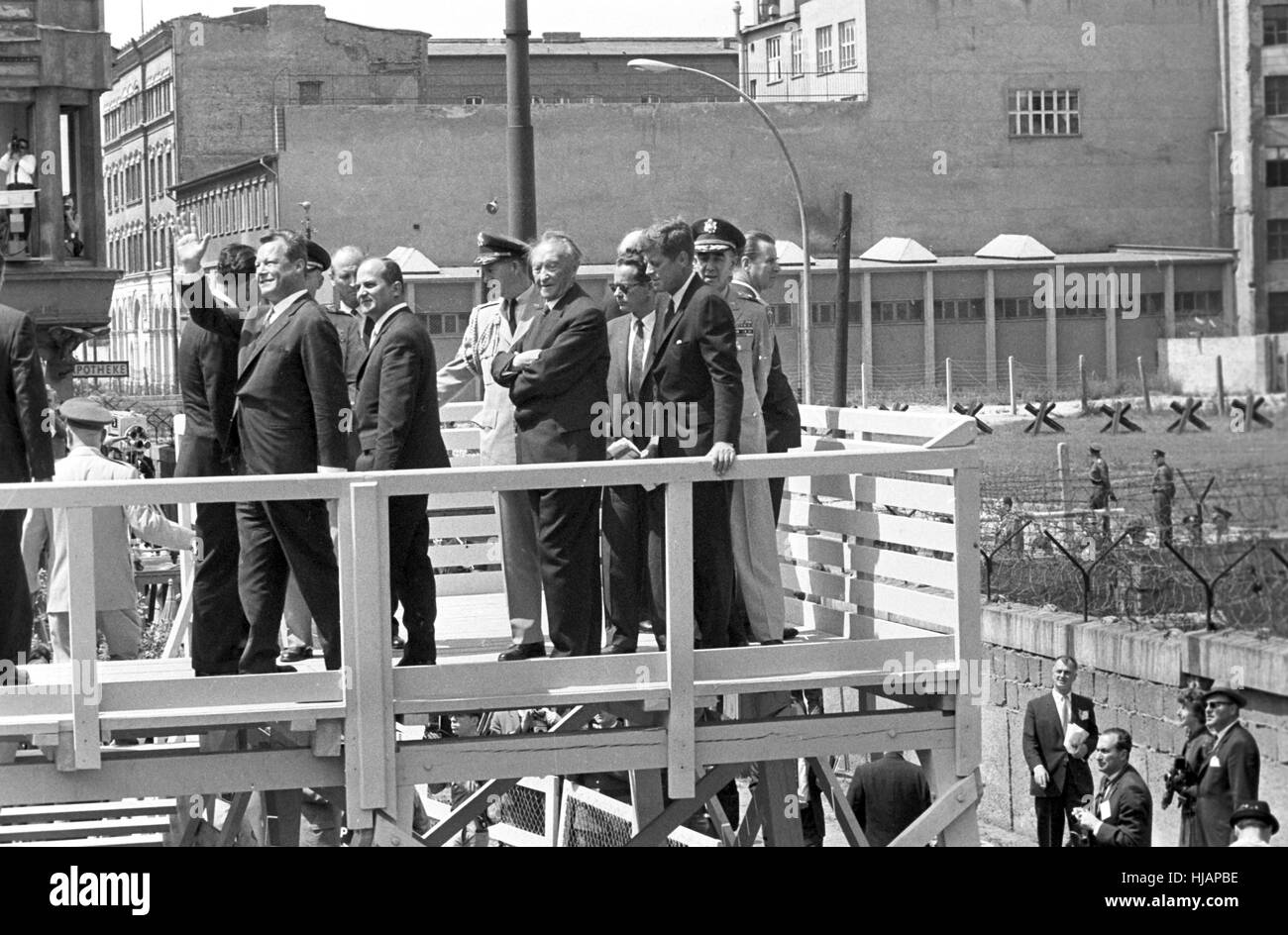 US president John F. Kennedy (r) at a view point at the Berlin wall on ...