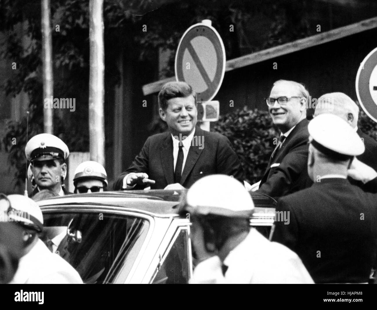 John F. Kennedy in Frankurt on 23 June 1963 in an open car with state ...