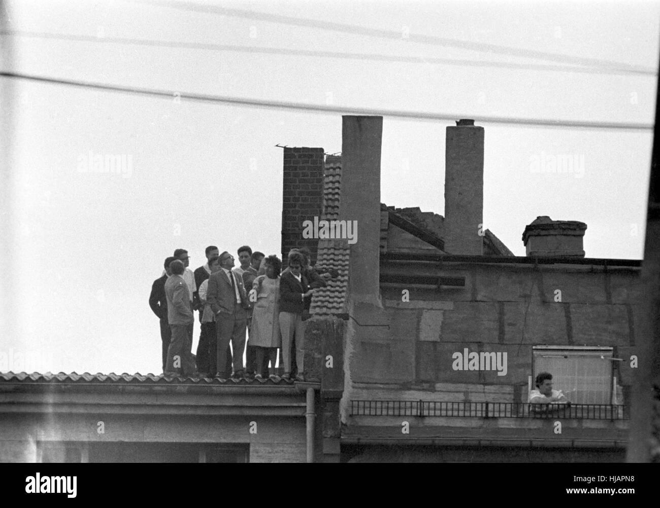 People even climbed on a roof to get a glimpse at the famous guest. US ...