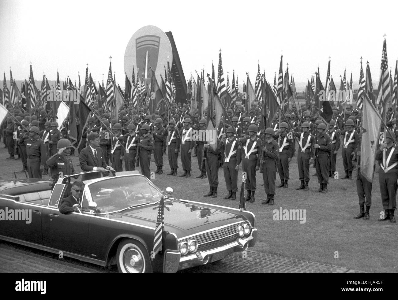 US president John F. Kennedy at a military parade at US air base ...