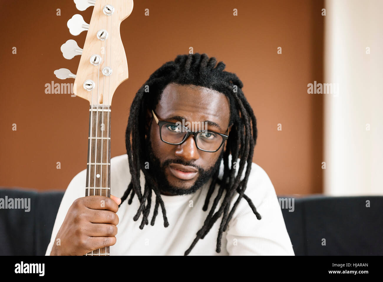 Artist producing music in his home sound studio Stock Photo - Alamy