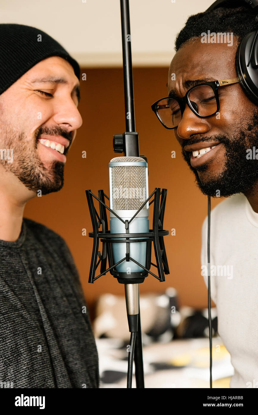 Multiracial artists singing on musical studio Stock Photo - Alamy