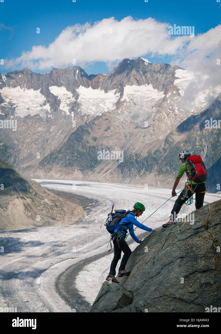 Couple climbing hi-res stock photography and images - Alamy