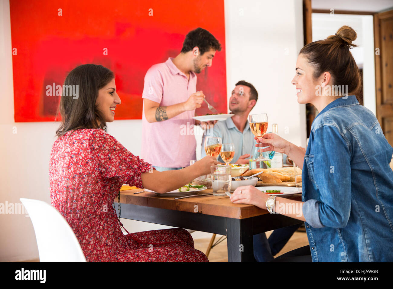 Friends dining together Stock Photo - Alamy