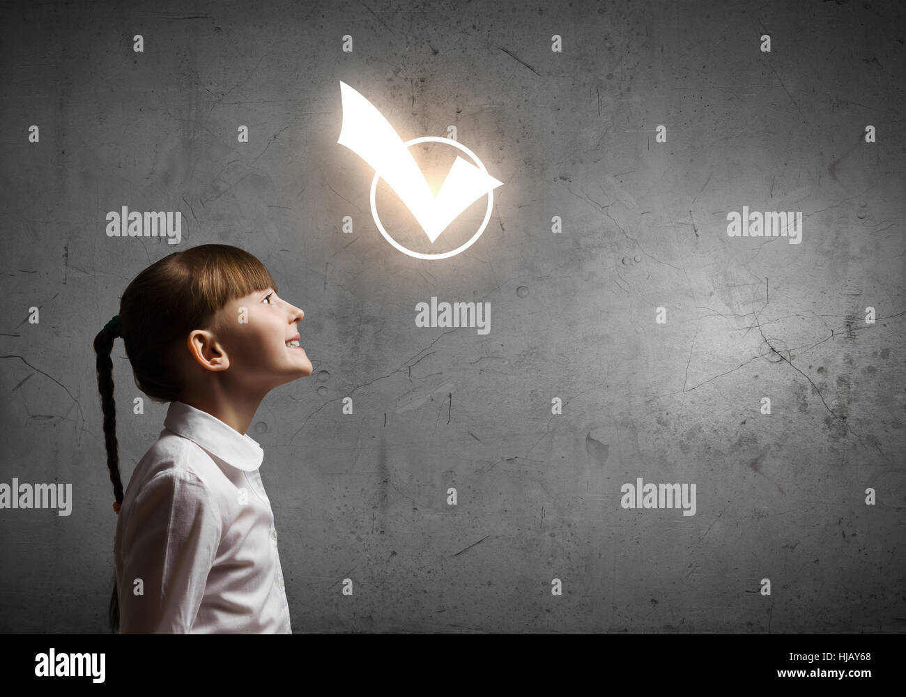 Side view of cute girl looking at tick hi-res stock photography and ...