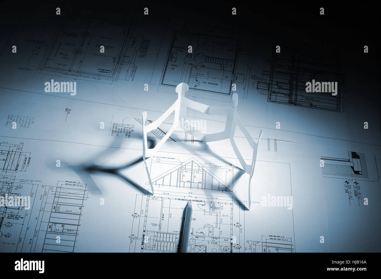 Drawings of building and small paper fellows hi-res stock photography ...