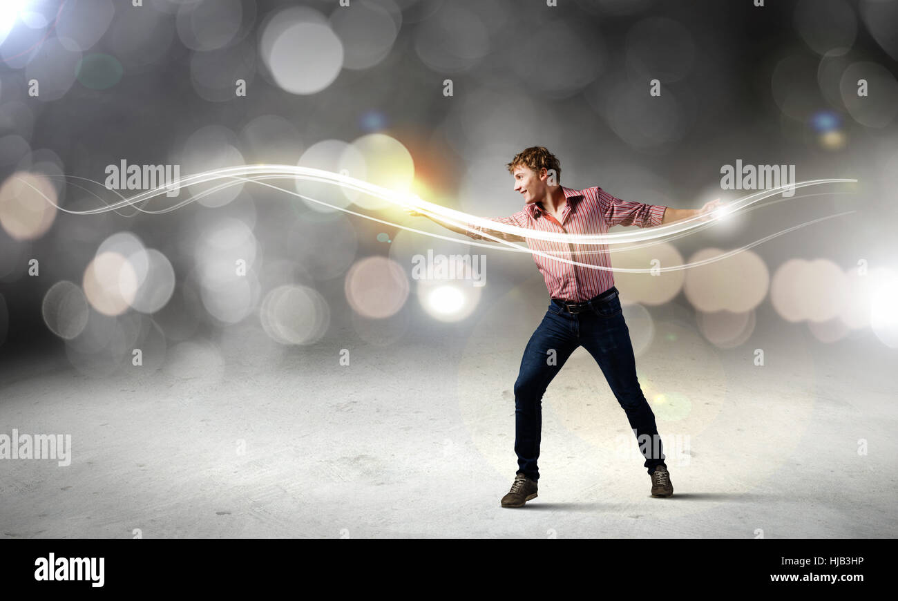 Young man in magic hi-res stock photography and images - Alamy