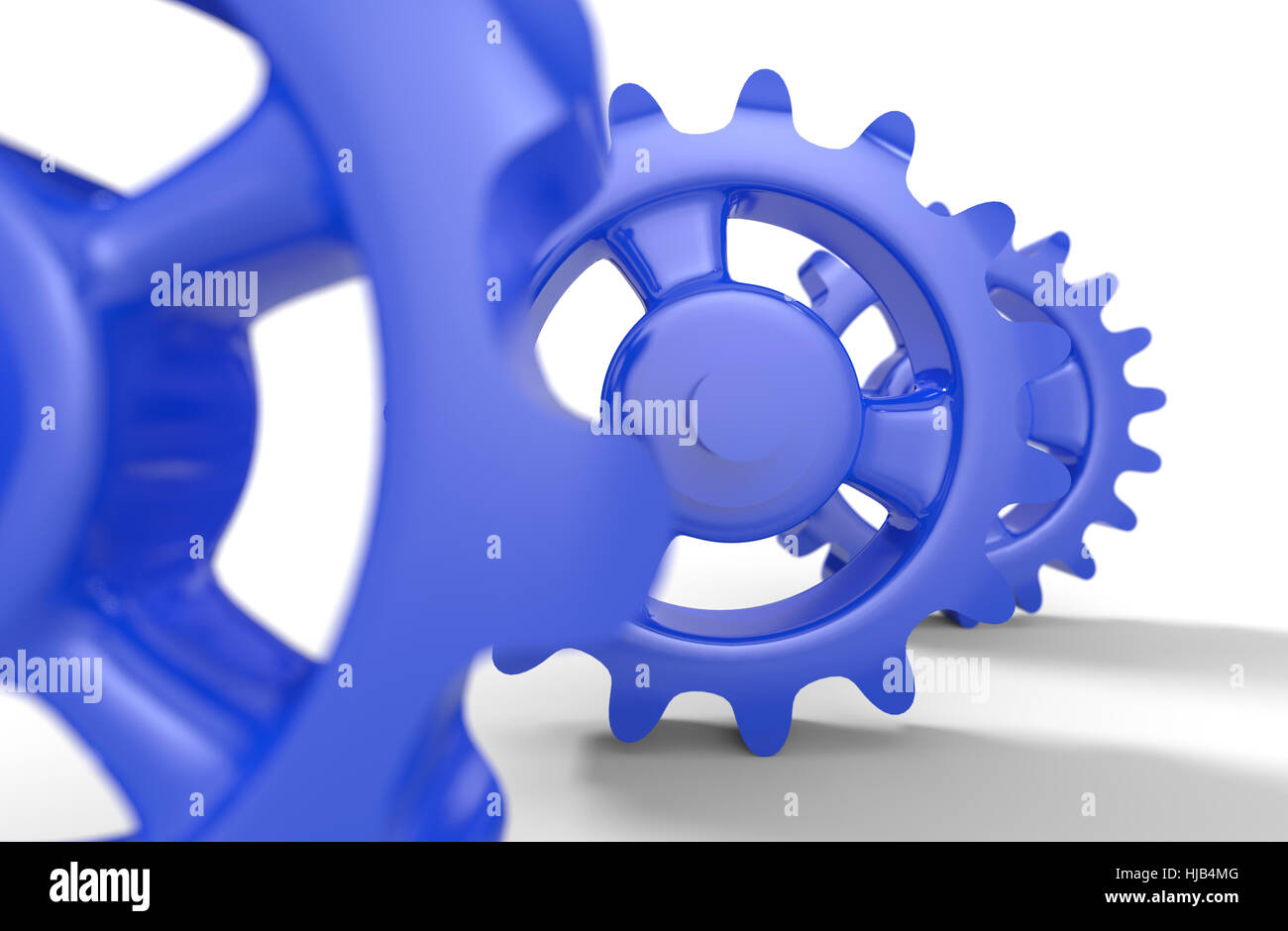 blue gears isolated 2 Stock Photo - Alamy