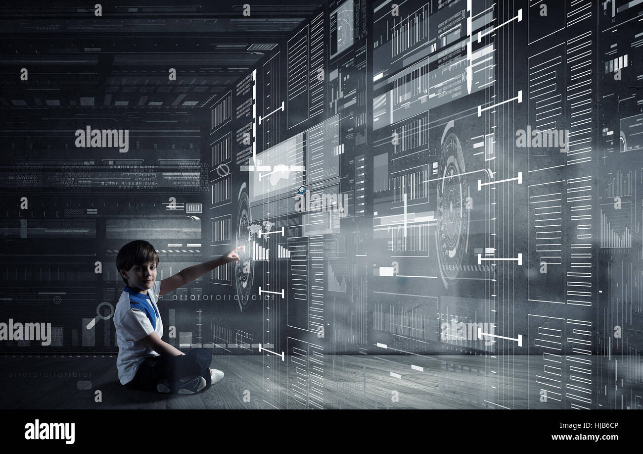 Boy touching virtual screen hi-res stock photography and images - Alamy