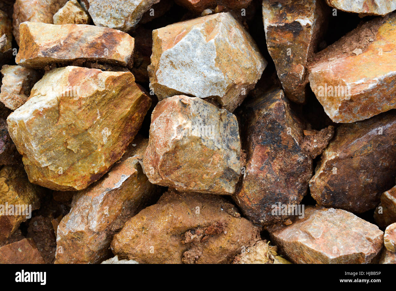 Background full of little rocks of the same type Stock Photo - Alamy