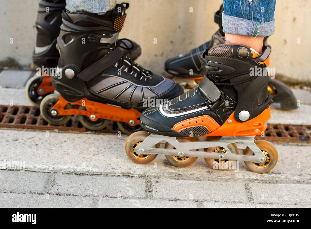 Legs in rollerblades Stock Photo - Alamy