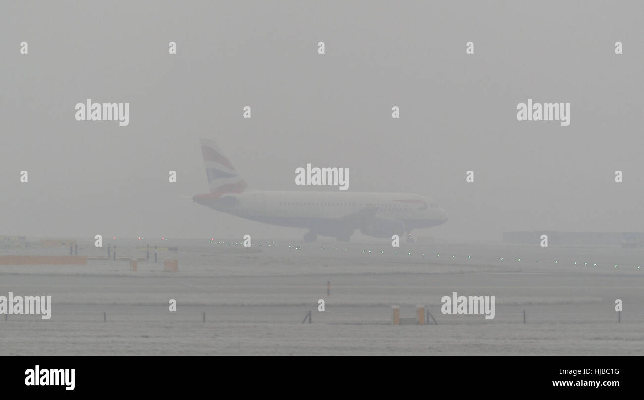 A British Airways plane on the tarmac at Heathrow Airport, London, as ...