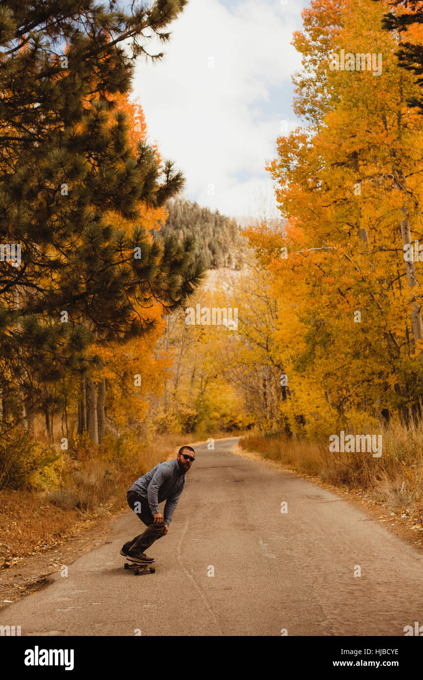 Young man on skateboard in rural hi-res stock photography and images ...