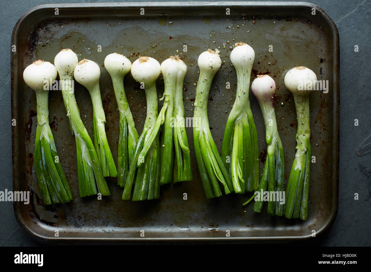 Whole spring onions cooked hi-res stock photography and images - Alamy