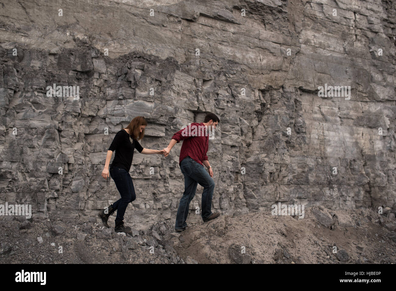 Couple walking on side of cliff, Ottawa, Ontario Stock Photo - Alamy