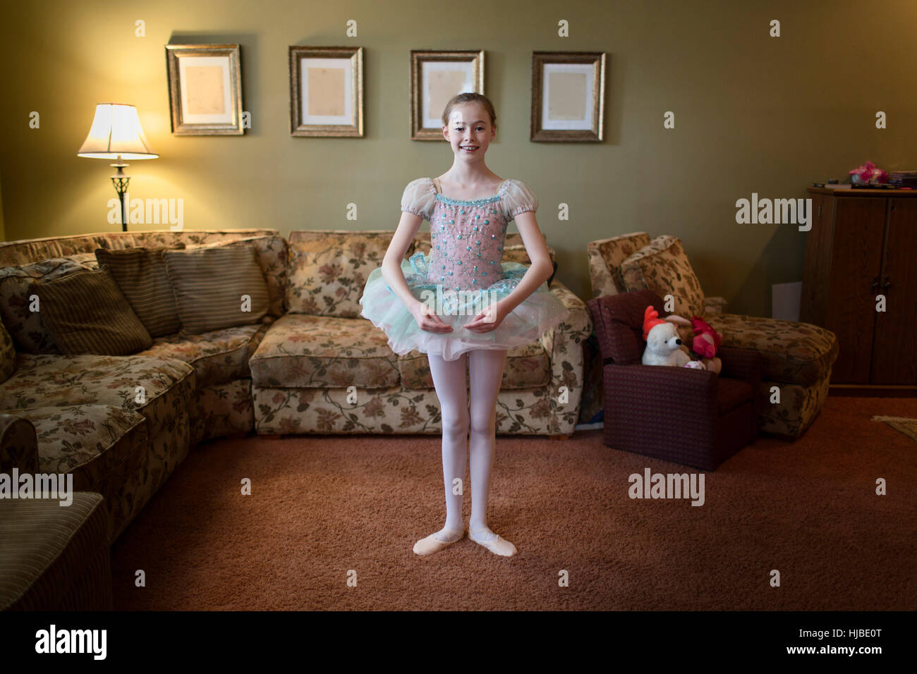 Girl in living room ballet dancing Stock Photo - Alamy