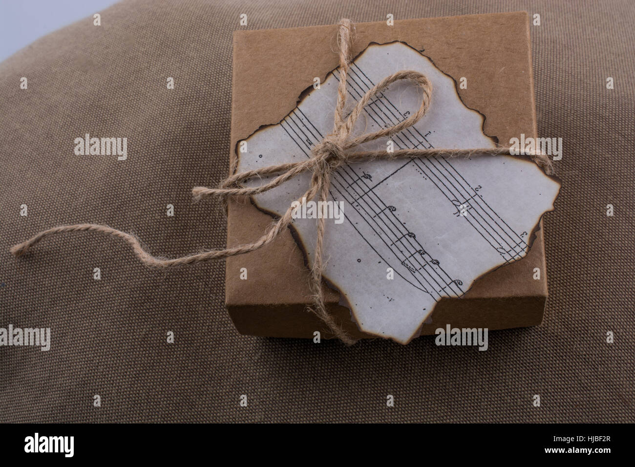Musical notes on a burnt paper on a brown background Stock Photo - Alamy