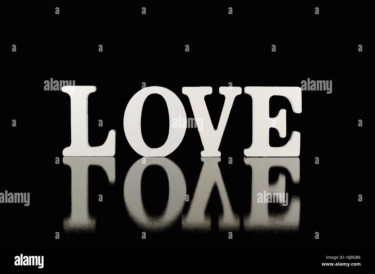 Word love, wooden letters on black background with reflection Stock ...