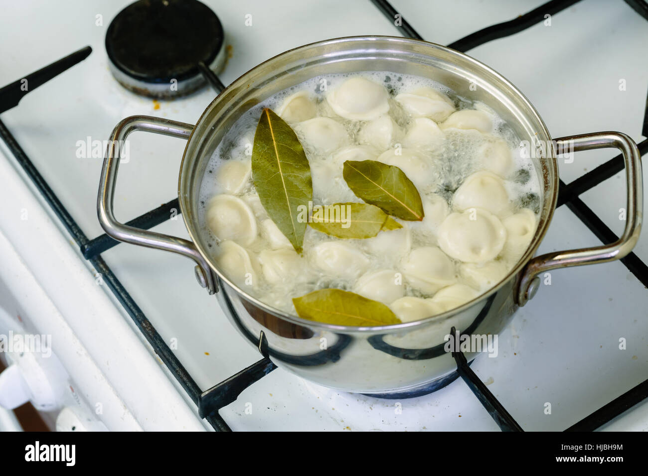 Boiled food in pot kitchen hi-res stock photography and images - Alamy