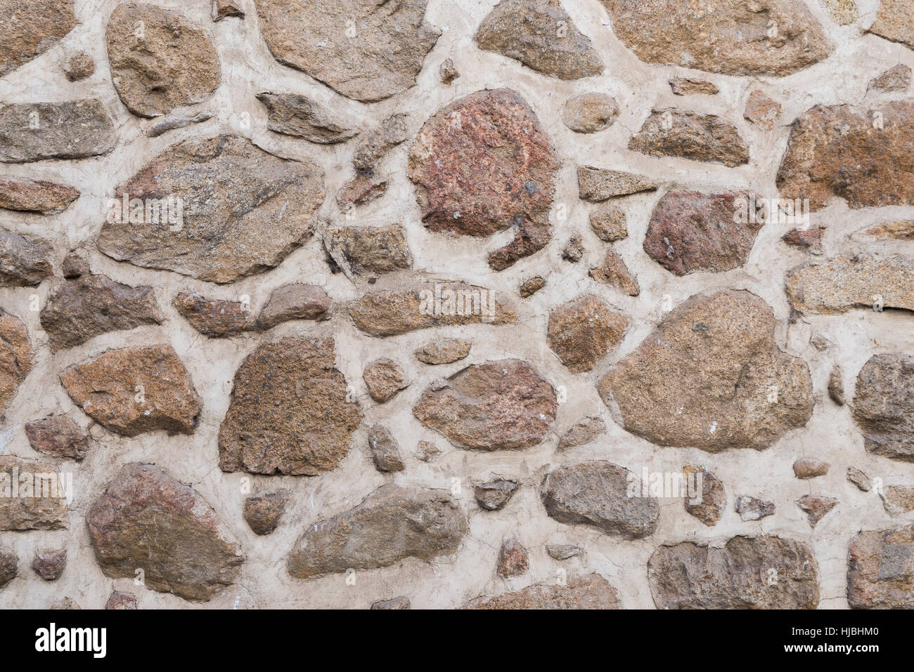 Old stone and brick medieval wall texture and background Stock Photo ...