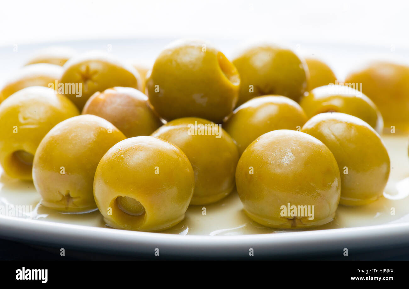 Green raw olives hi-res stock photography and images - Alamy