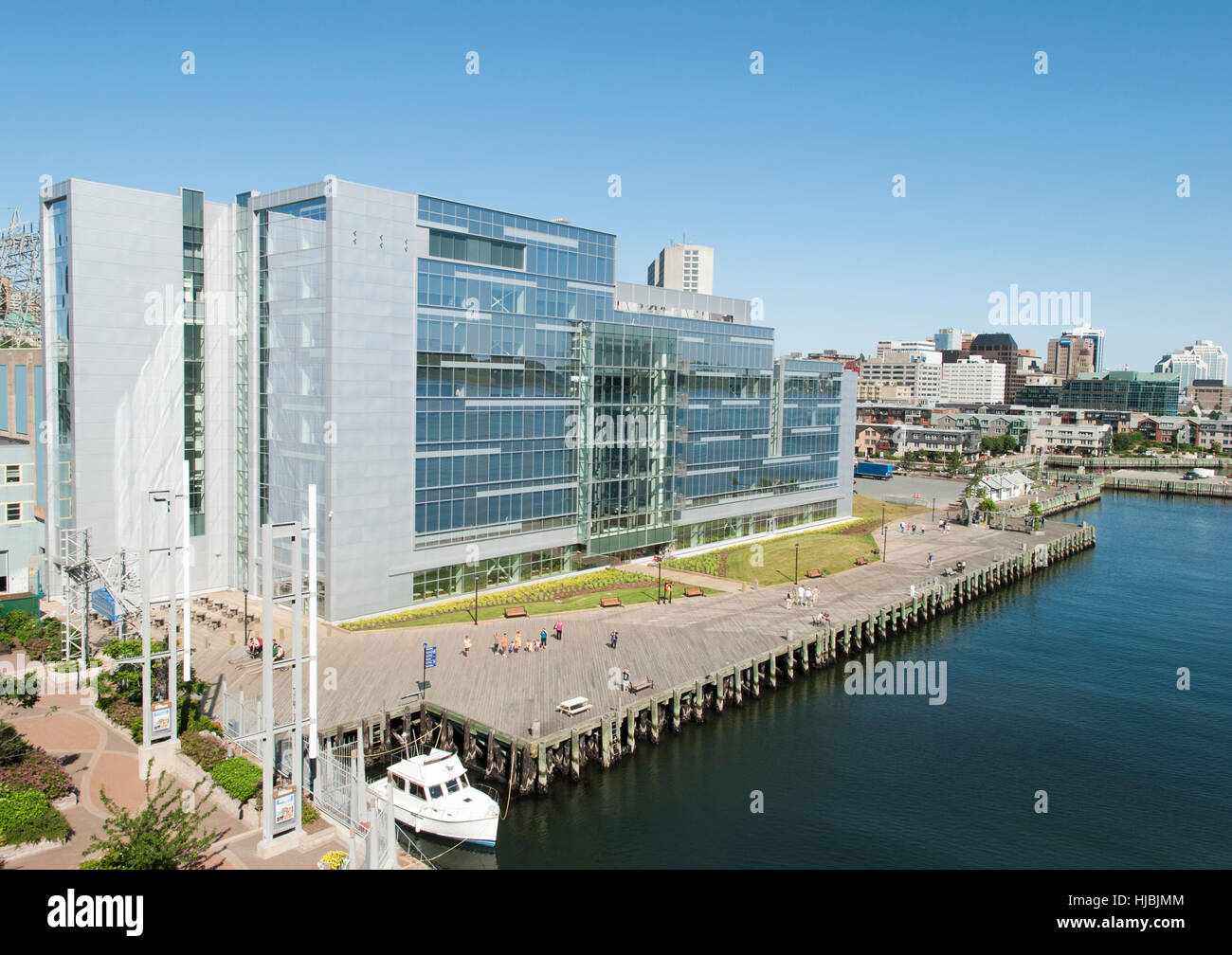 The view of Halifax city wooden waterfront with modern building behind ...