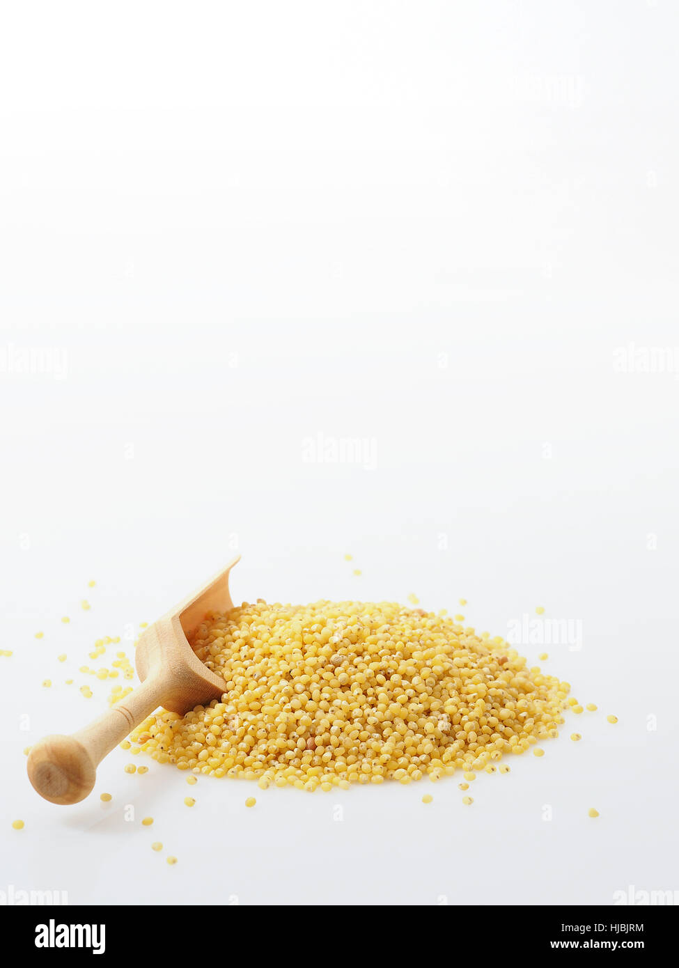 Save Download Preview Millet with scoop isolated on white background ...