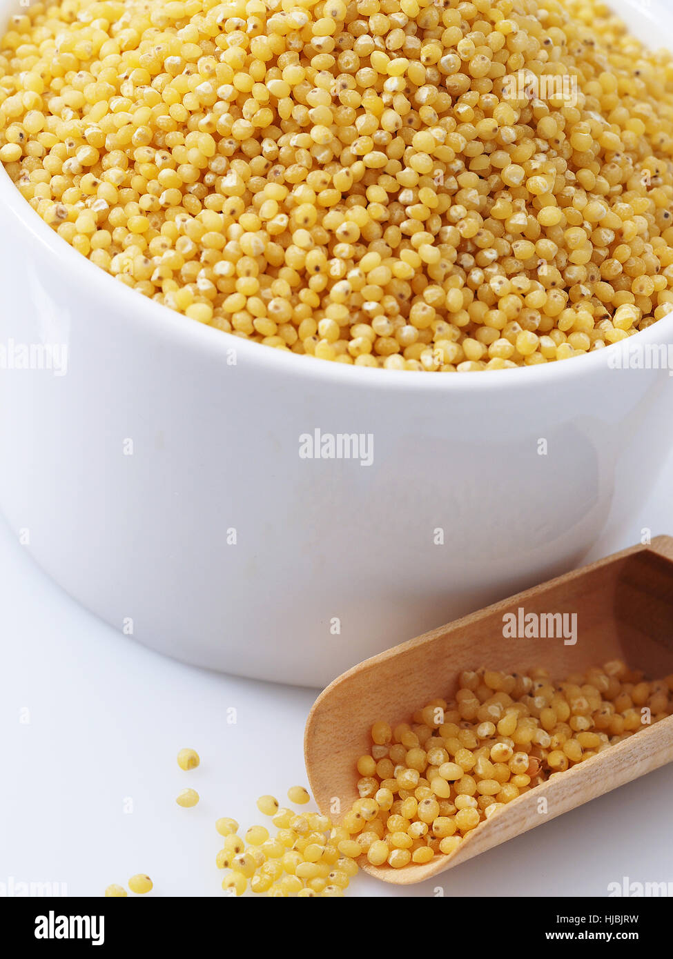 Save Download Preview Millet with scoop isolated on white background ...