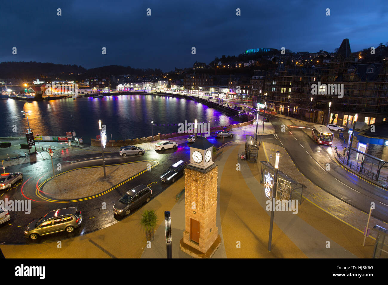 Town of Oban, Scotland. Evening view of Oban harbour with the clock ...