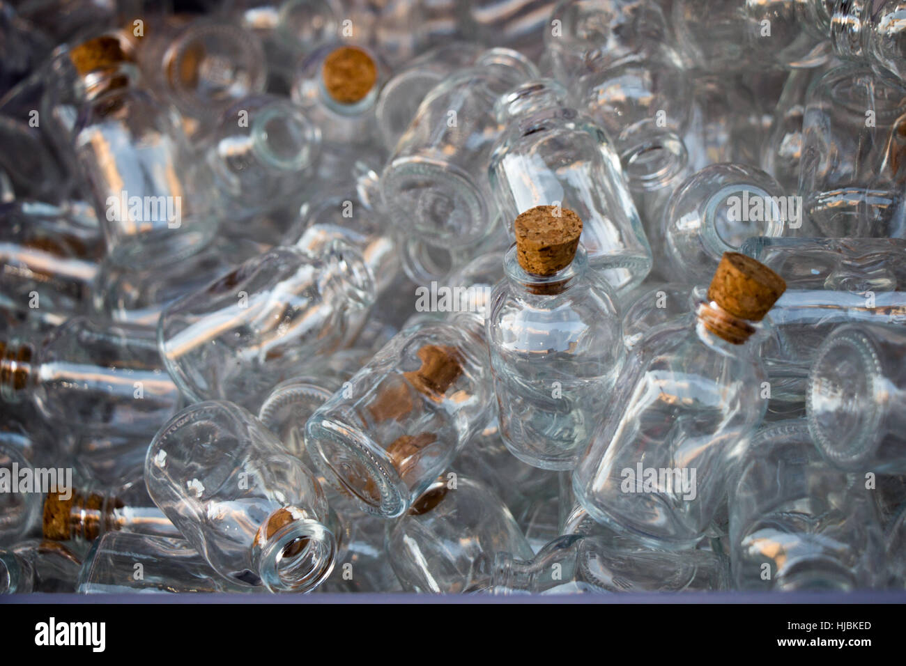 Set of Empty small transparent bottles in a box Stock Photo - Alamy