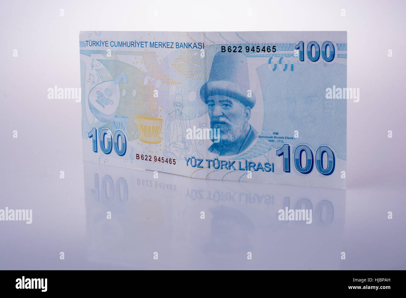 Turksh Lira banknotes of 100 Lira on white background Stock Photo - Alamy
