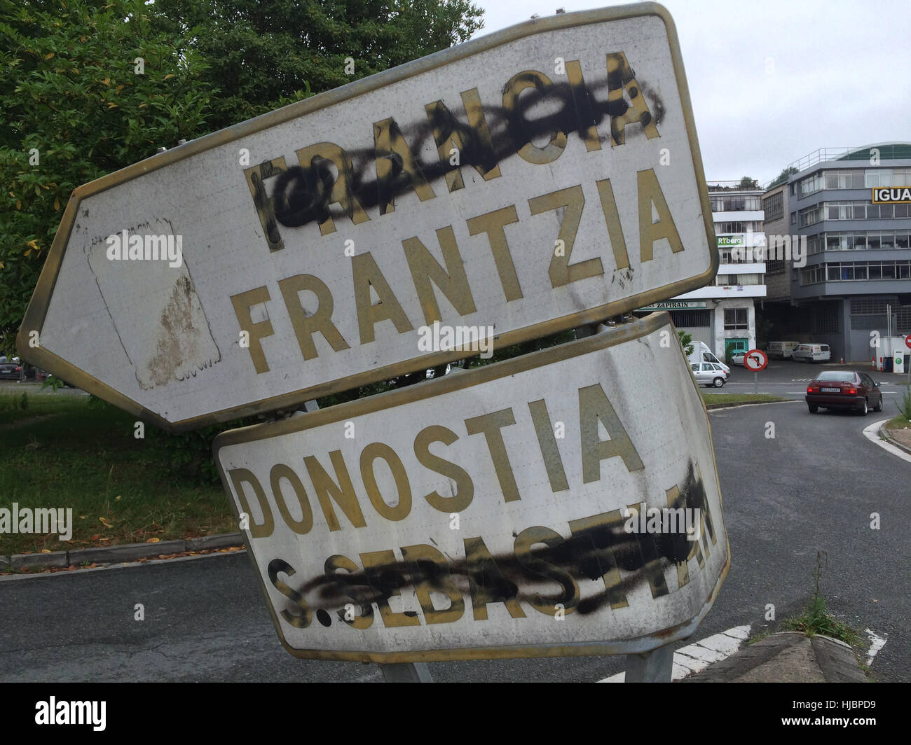 Direction traffic signs to France and to San Sebastian (Donostia) in ...