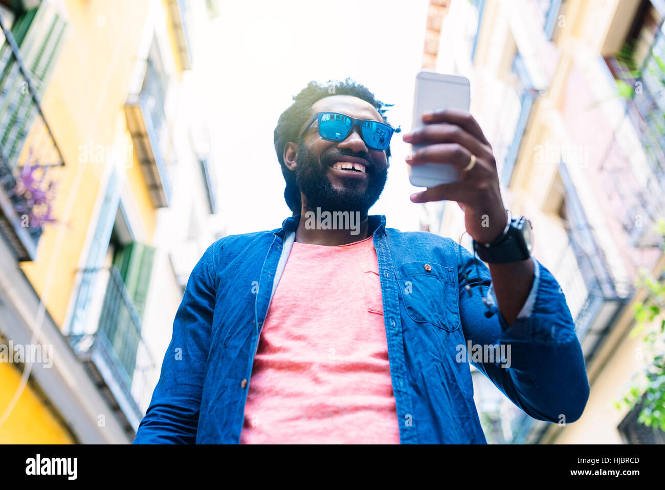 Young Man Writing Message Stock Photo - Alamy