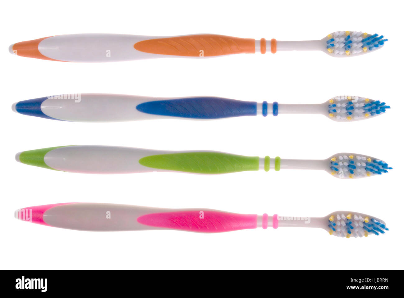 Colored toothbrushes. Isolated on white background. Clipping path ...