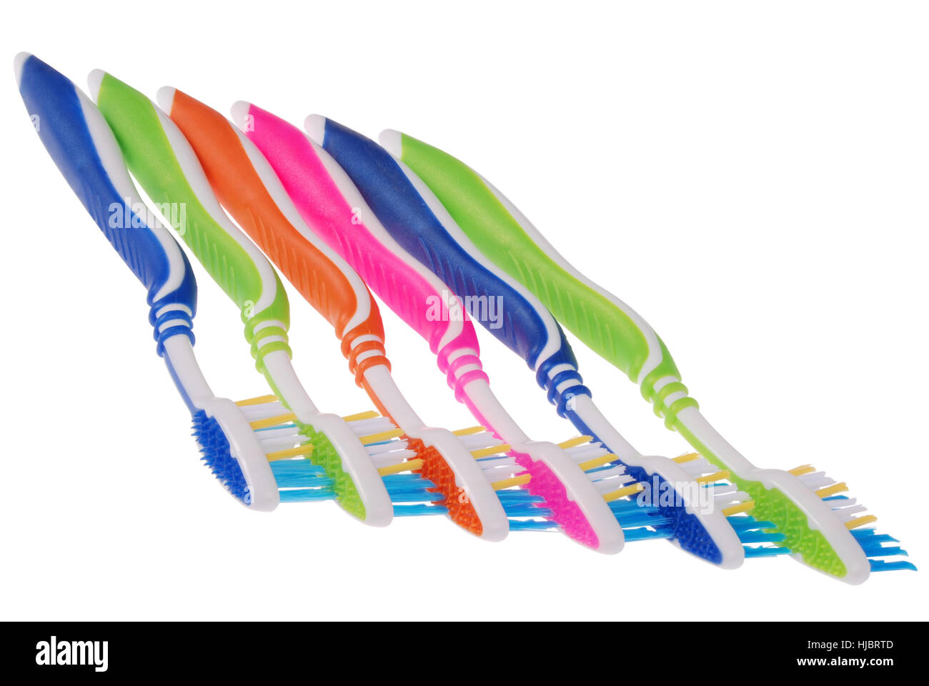 Colored toothbrushes. Isolated on white background. Clipping path ...