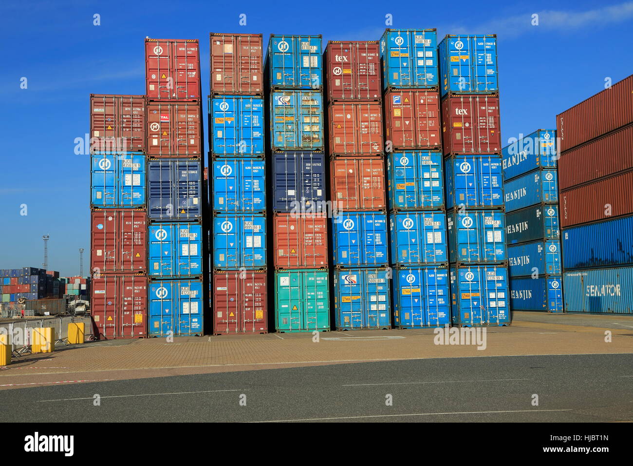 Containers stacked high on dockside, Port of Felixstowe, Suffolk ...