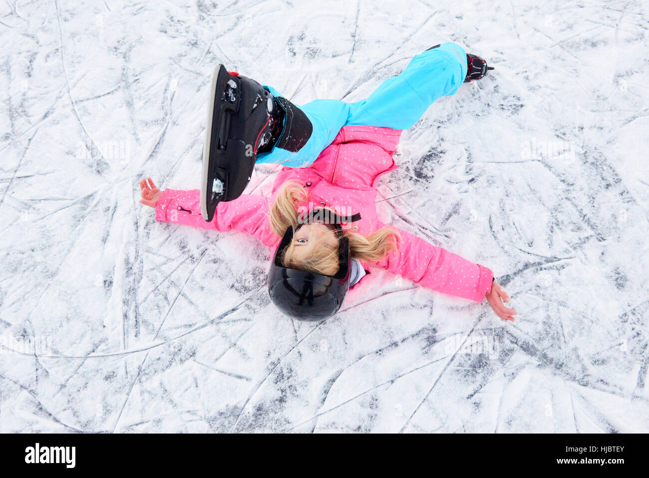 Ice skater lying on ice hi-res stock photography and images - Alamy