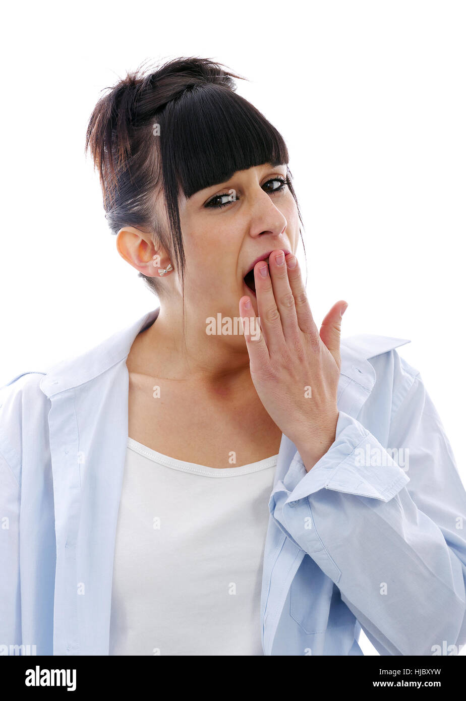 Yawning tired woman isolated on white background Stock Photo - Alamy